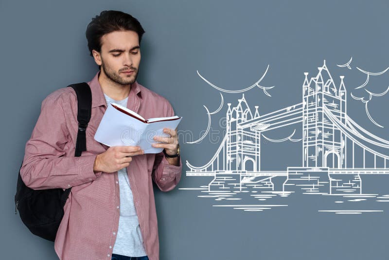 Serious Student Looking Attentive while Reading a Book Stock Image ...