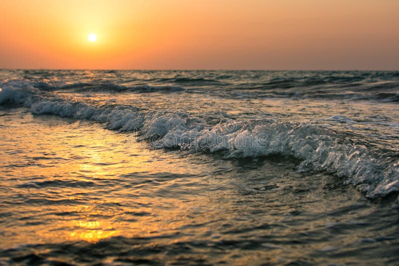Calm sunset on the beach stock image. Image of storm - 104688137