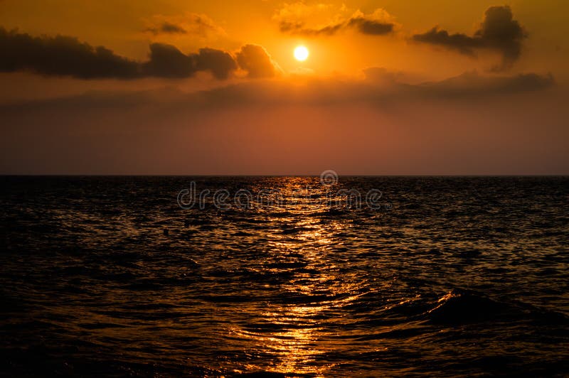 Calm Warm Ocean Sunset stock image. Image of light, reflections - 57417371