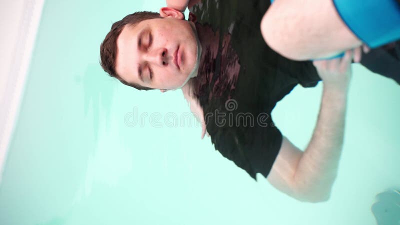 Calm Water Rescue Training Man Practicing Back Float and Assisted ...