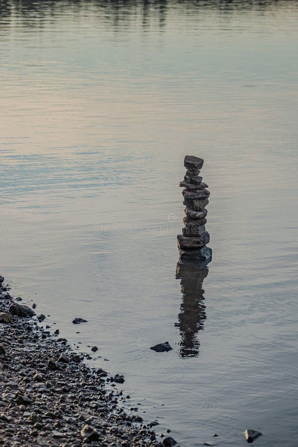 Calm Waters and Piled Up Rocks Stock Photo - Image of harmony ...