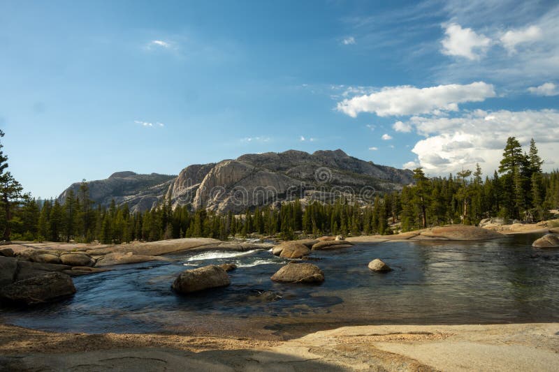 Calm Waters of the Tuolumne River Flowing between Granite Rocks Stock ...
