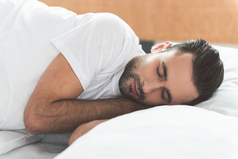 Serene Man Sleeping on His Bed Stock Photo - Image of face, beauty ...