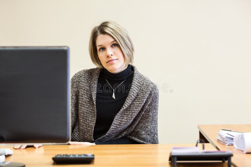 Calm Young Woman Sittigng at Desk Behind Pc Screen Stock Image - Image ...