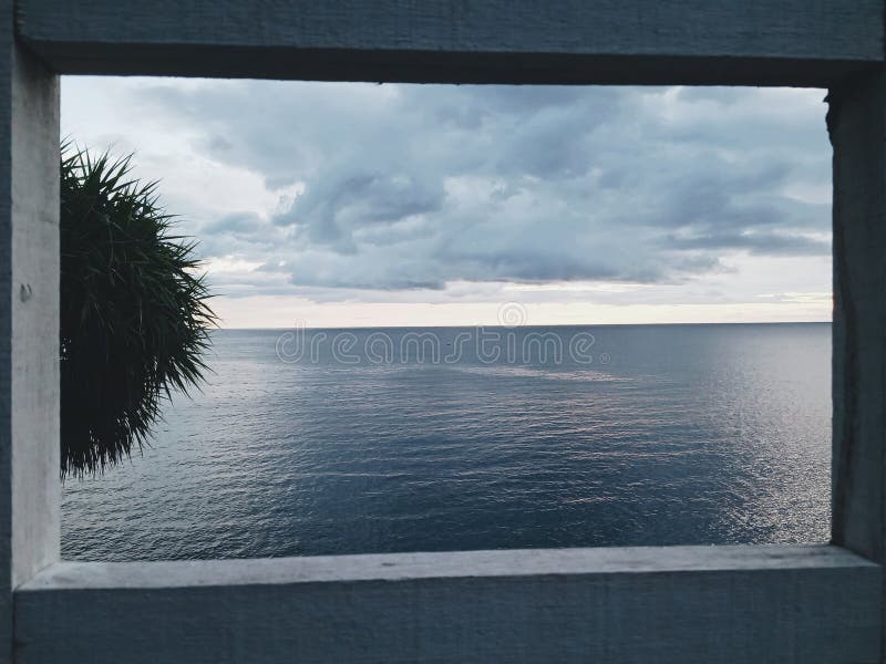 The Calmness of the Sea in a Cloudy Day Stock Image - Image of ...