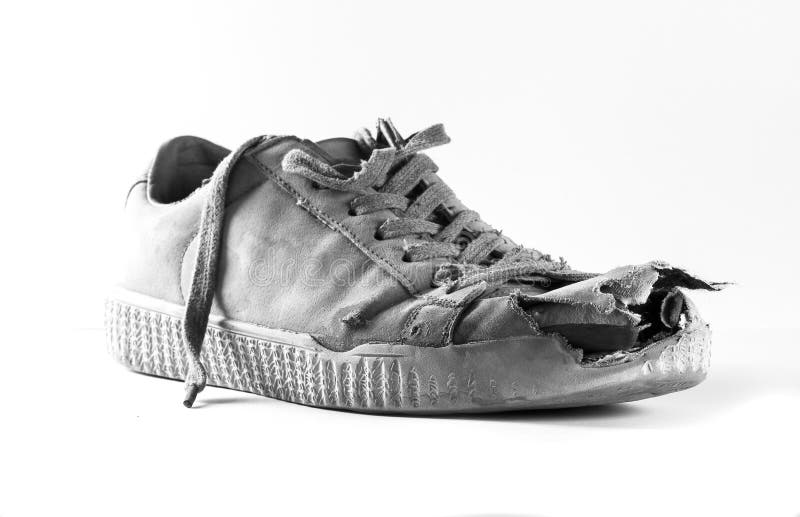 Zapatos Rotos Viejos Con El Lenguado Agrietado Imagen de archivo ...