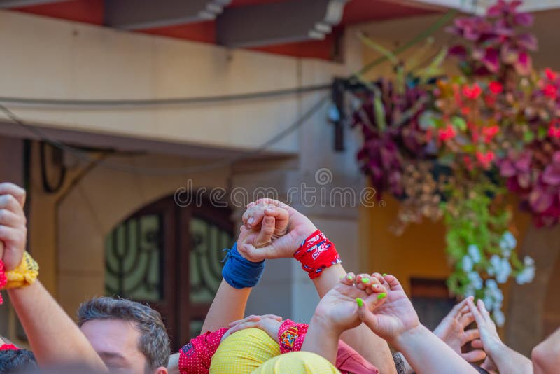 Hands at a Castells Performance, a Castell is a Human Tower Built ...