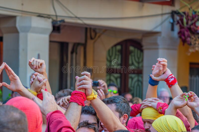 Hands at a Castells Performance, a Castell is a Human Tower Built ...