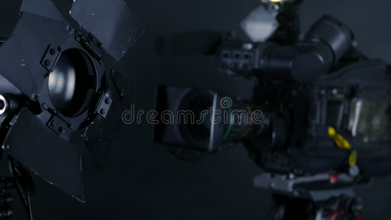 Camcorder, Video Camera and Professional Studio Lights in a ...