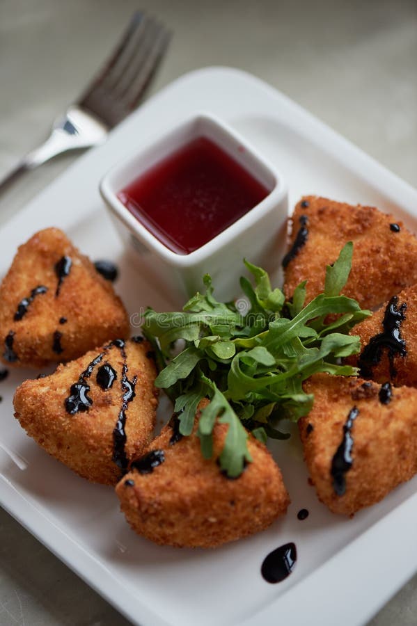 Camembert in Batter, Deep Fried,with Balsamic Vinegar and Arugula Stock ...