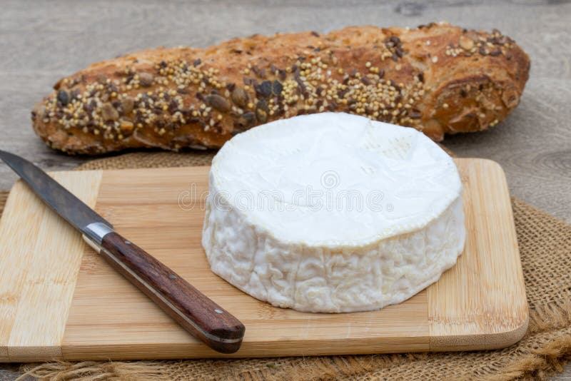 Camembert Cheese and Bread on a Table Stock Photo - Image of table ...