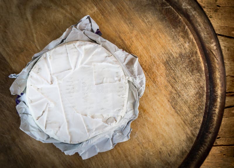 Camembert Cheese on Old Chopping Board Stock Photo - Image of freshness ...