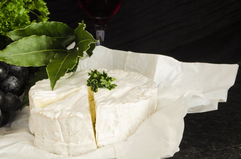 Camembert and Fresh Ingredients Stock Photo - Image of black, board ...