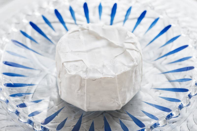 Camembert on glass plate stock photo. Image of food, delicatessen ...