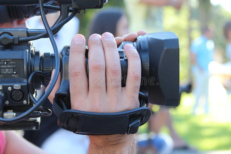 Cameraman filming editorial stock photo. Image of microphone - 15911778
