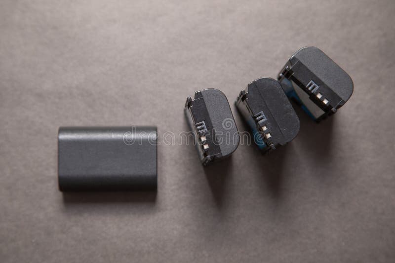 Camera Batteries on the Black Background Stock Illustration ...