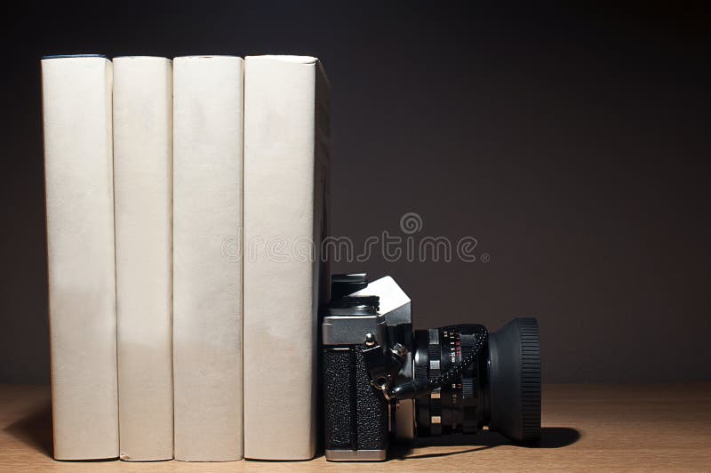 Camera and books stock image. Image of vintage, book - 26346641