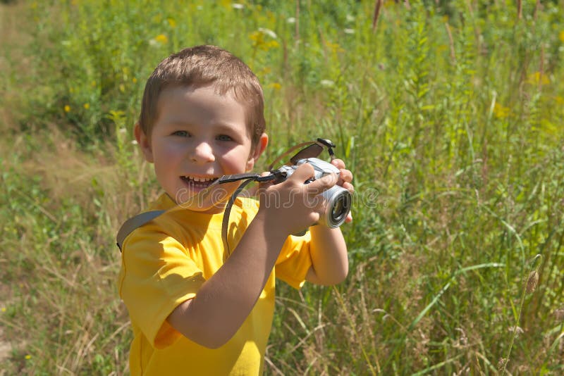 Camera boy stock image. Image of taking, small, photograph - 49642153