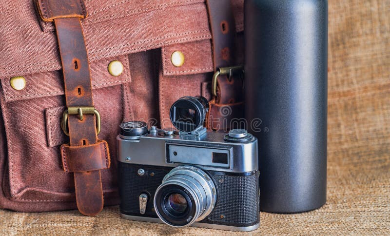 Camera and Briefcase on the Table Stock Image - Image of camera, cake ...