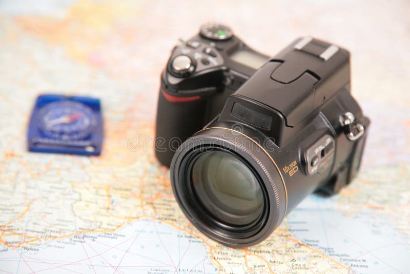 Camera and compass on map stock photo. Image of historic - 4387644