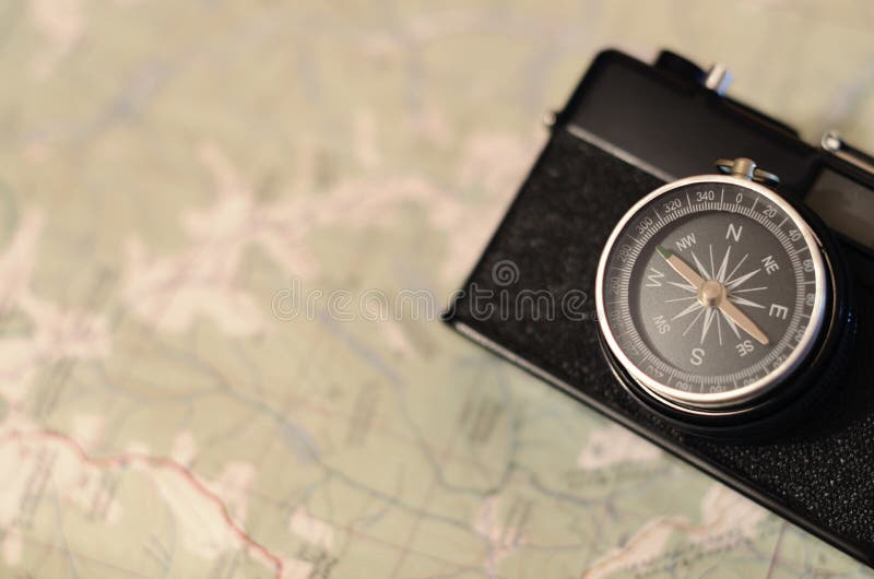 Camera compass at the map stock photo. Image of journey - 92206124