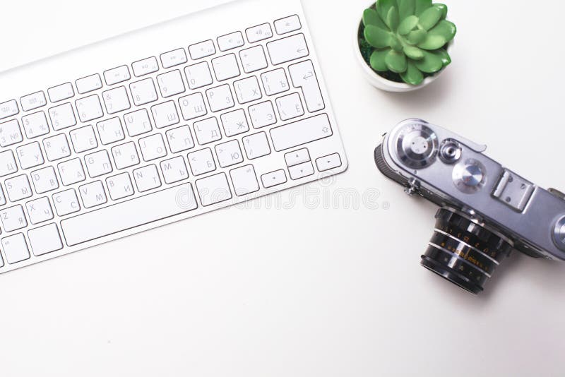 Camera and Computer Keyboard on the Desktop Stock Image - Image of ...