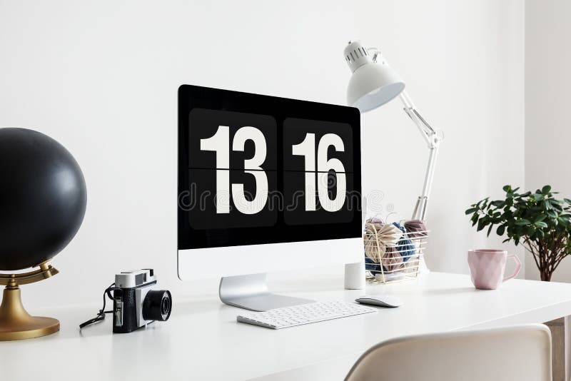 Camera and Desktop Computer on White Desk with Lamp in Freelancer`s ...
