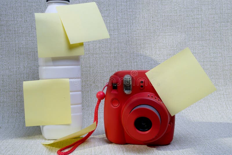 Camera and Drinking Bottles with Sticky Notes Stock Photo - Image of ...