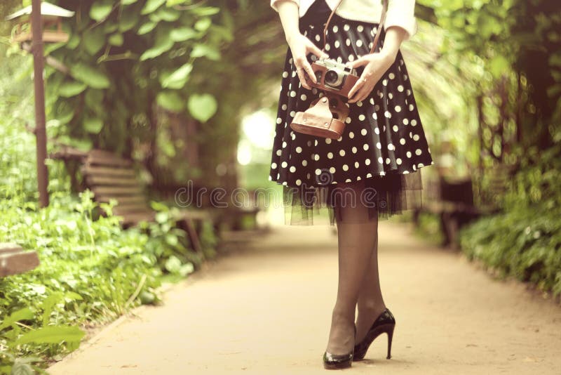 Camera and female legs stock photo. Image of dandy, retro - 95361266