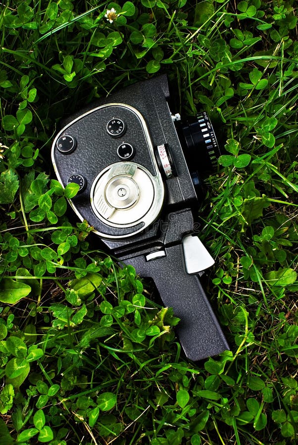 Camera on grass stock image. Image of outdoor, handle - 15350775