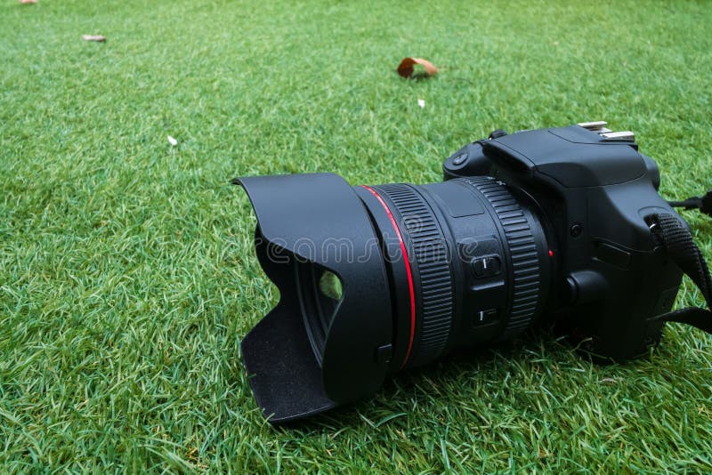 Camera on a Grass Background Stock Photo - Image of green, technology ...