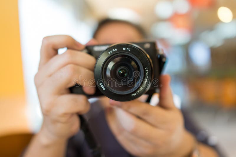 Camera in hand stock photo. Image of professional, digicam - 36068816