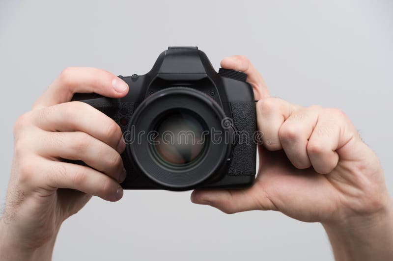 Camera in hands. stock image. Image of caucasian, studio - 33436523