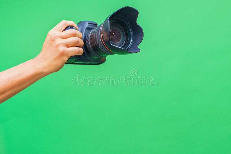 Camera in Hands on Isolated Green Screen Stock Image - Image of ...