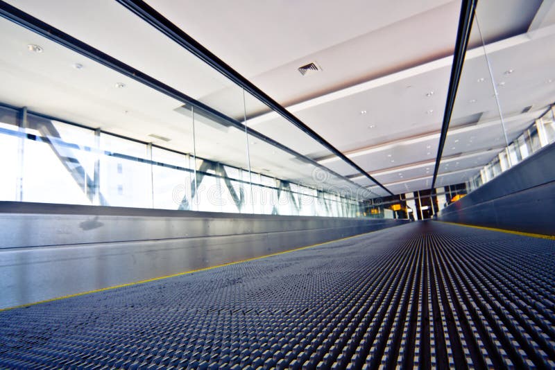 Camera Lay on Escalator View in Violet Corridor Stock Photo - Image of ...