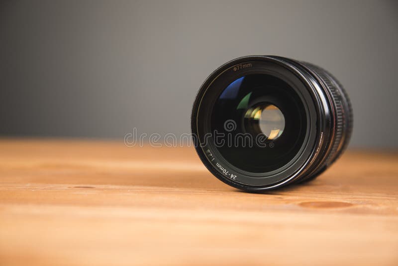 Camera lens on the table stock image. Image of digital - 217261087