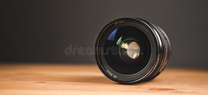 Camera lens on the table stock image. Image of shot - 217261115