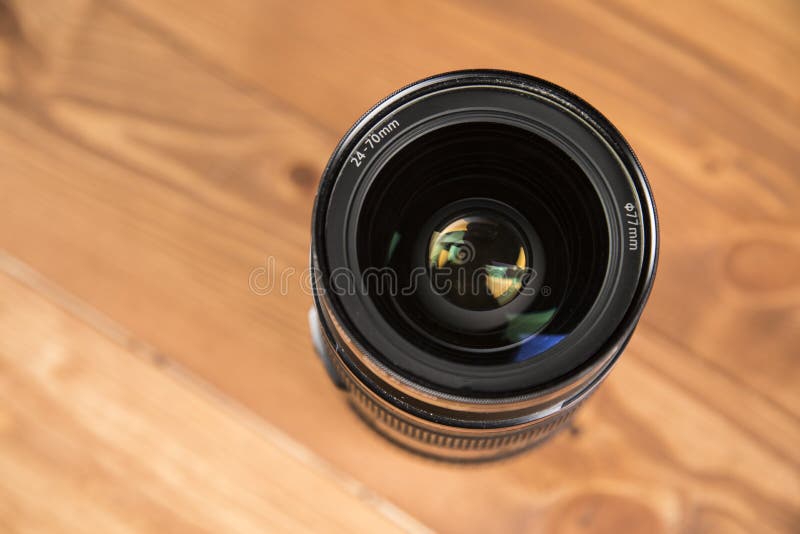 Camera lens on the table stock photo. Image of optics - 217261140