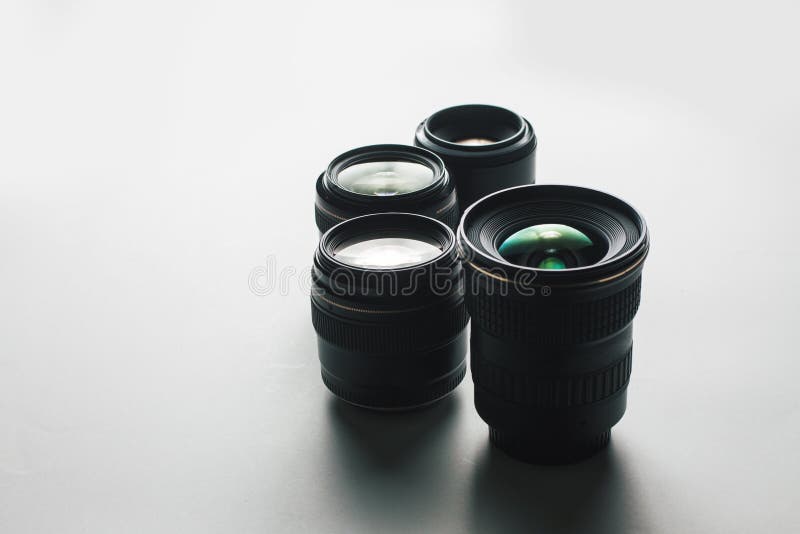 Camera Lenses on a White Surface Stock Photo - Image of camera ...