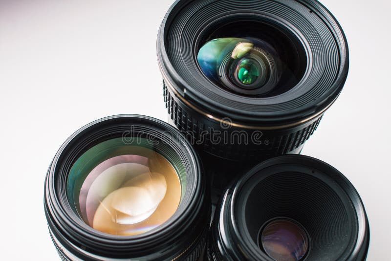 Camera Lenses on a White Surface Stock Photo - Image of lens, closeup ...