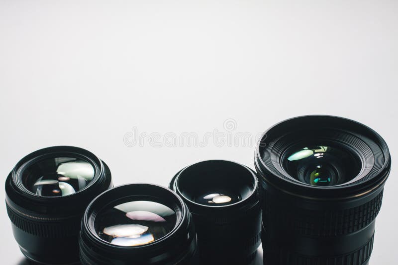 Camera Lenses on a White Surface Stock Image - Image of iris, closeup ...