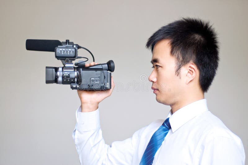 Cameraman stock image. Image of tape, computer, videocamera - 339169