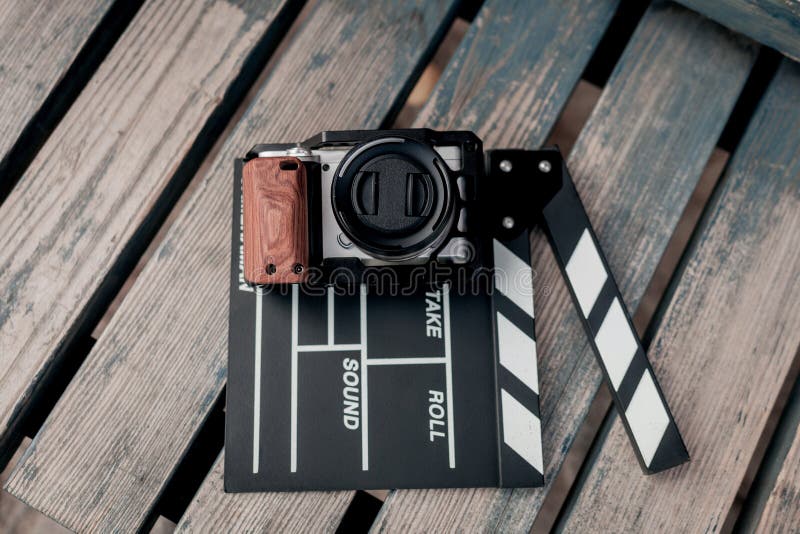 Clapper board and camera stock photo. Image of direct - 221598464