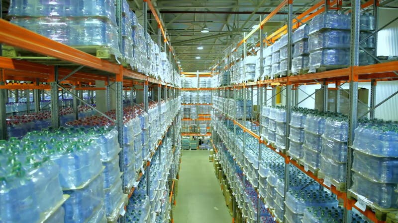 Camera Moving Down the Shelves of Pure Bottled Water Stock Footage ...