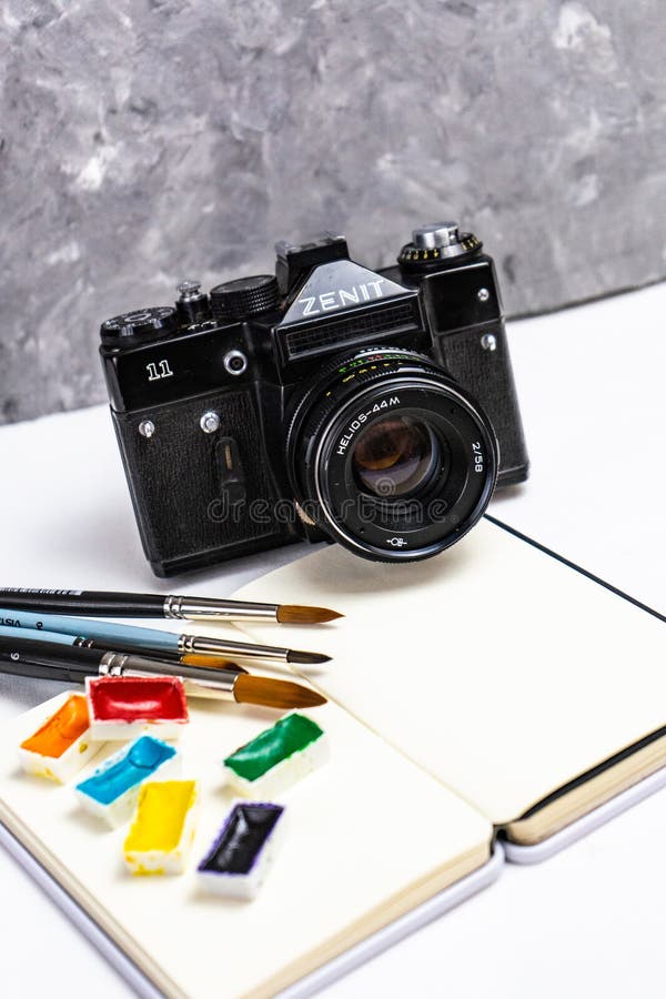 Camera, Notepad, Paints and Brushes. Editorial Image - Image of ...