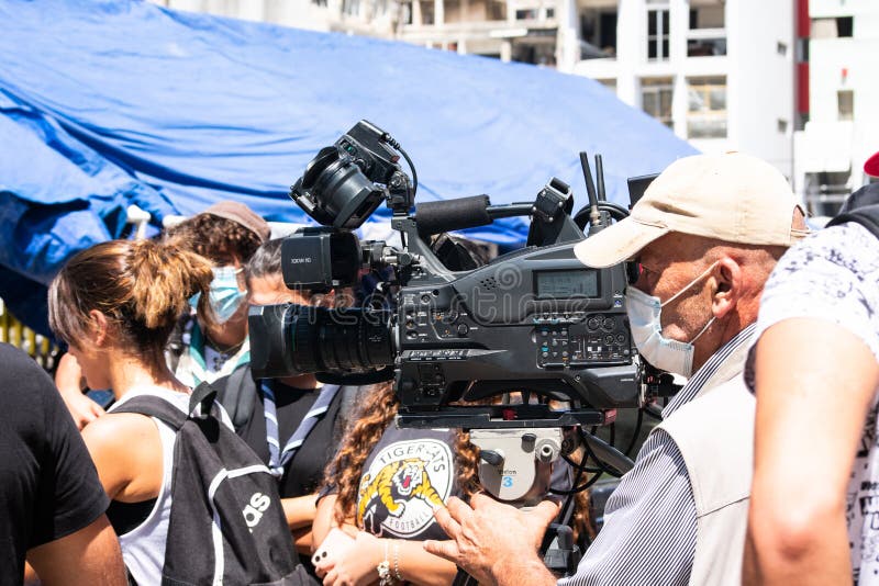 Camera Operator with Protective Mask Filming an Event Editorial Stock ...