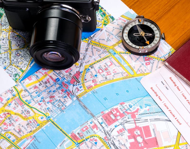 Camera, Passports with Tickets, Compass, City Map Editorial Photography ...