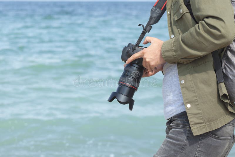 Camera in the Photographer Hand Stock Image - Image of nature, fashion ...