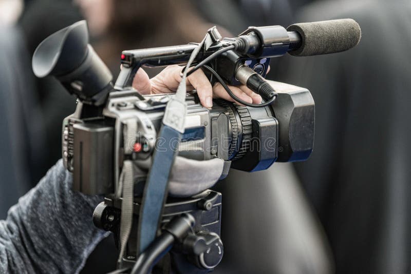 Camera at press conference stock image. Image of equipment - 216923851