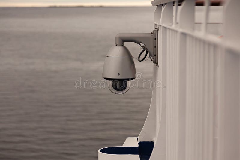 Camera at Railing on Large Ferry with Sunset in the Background Stock ...